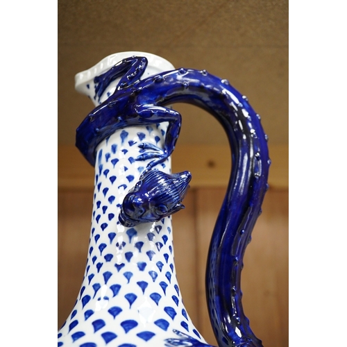 An unusual late 19th century Royal Worcester 'dragon' jug with blue ...