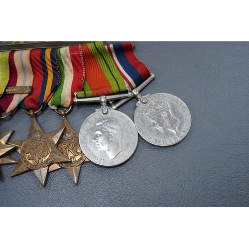 Three WWII medal groups (15 medals in total);a seven medal group ...