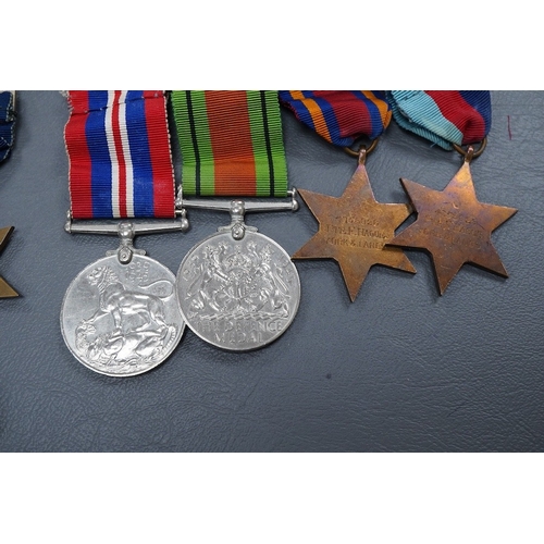 Three WWII medal groups (15 medals in total);a seven medal group ...