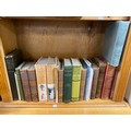 A shelf of books relating to country pursuits, hunting, fishing etc