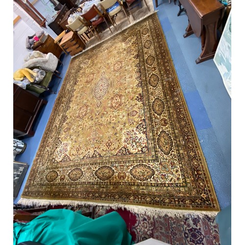 A large wool Keshan rug, approximately 276 x 365cm