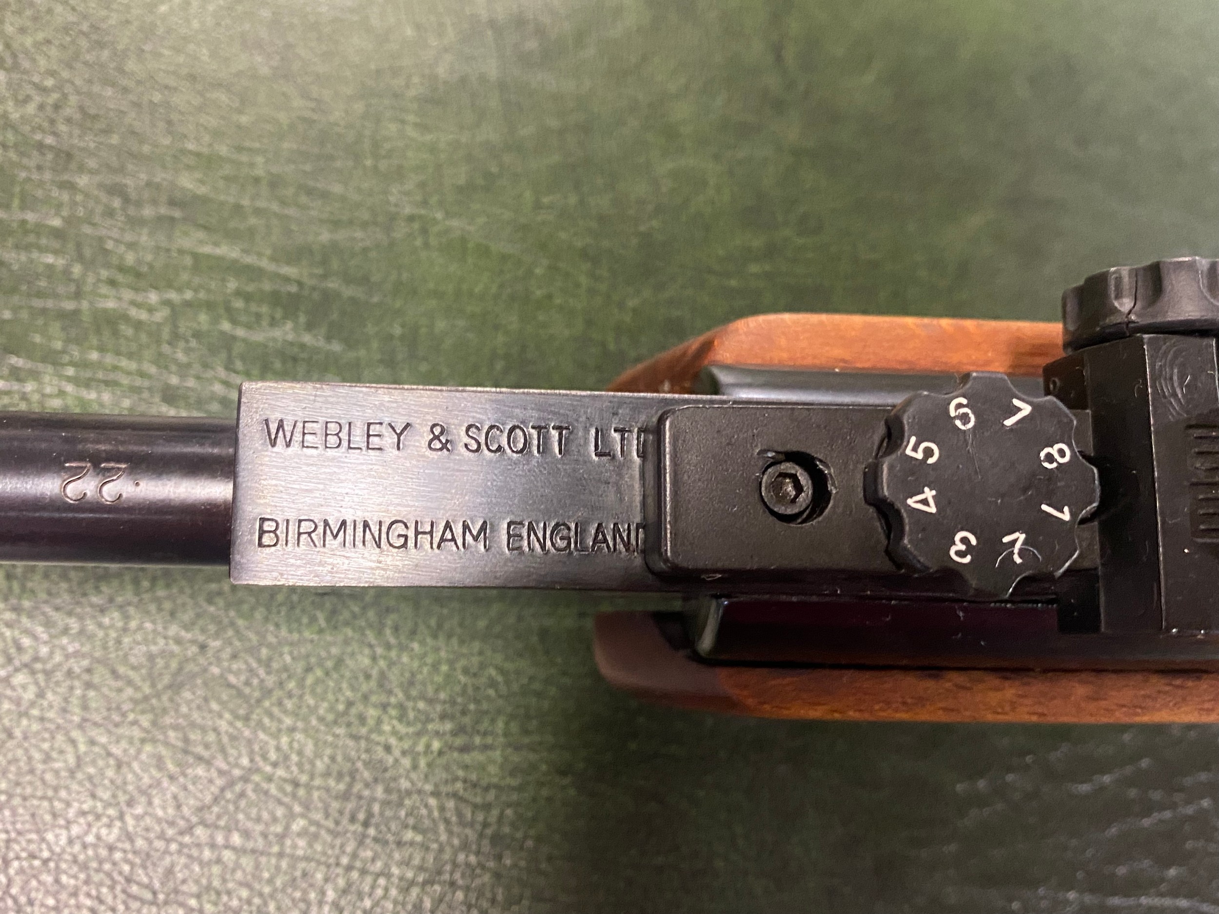 A Webley Vulcan .22 break barrel air rifle with scope and case