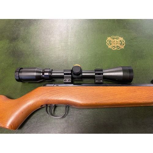 A Webley Vulcan .22 break barrel air rifle with scope and case