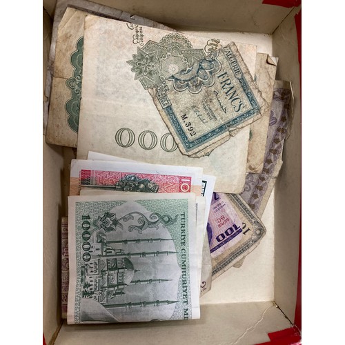 A small quantity of World coins and banknotes