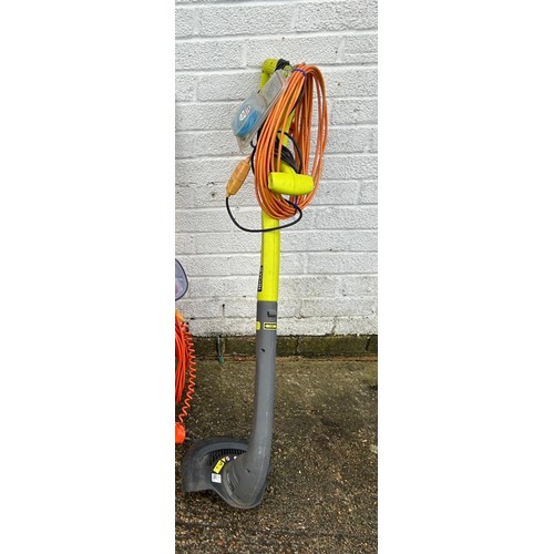 A Ryobi Easy Edge 180 electric edge trimmer