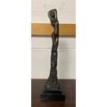 Jennine Parker. British b. 1971 A sculptural bronze figure, on marble ...