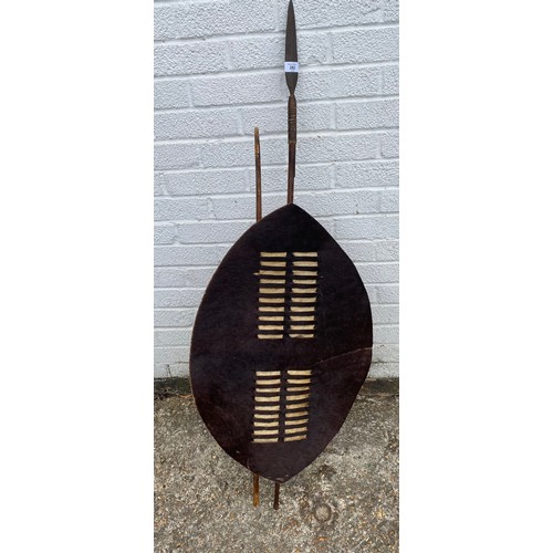An African hide shield and spear
