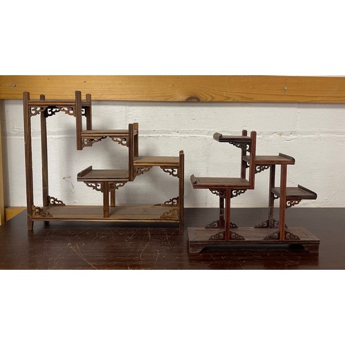 A pair of Chinese tiered stands