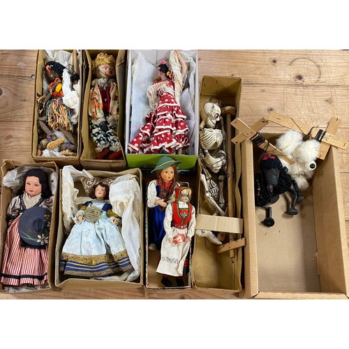 Two Pelham Puppet poodles, a skeleton, clown and dancer, and a group of ...