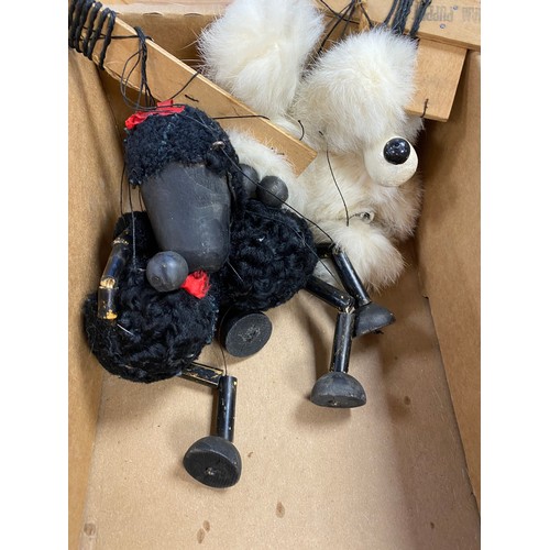 Two Pelham Puppet poodles, a skeleton, clown and dancer, and a group of ...