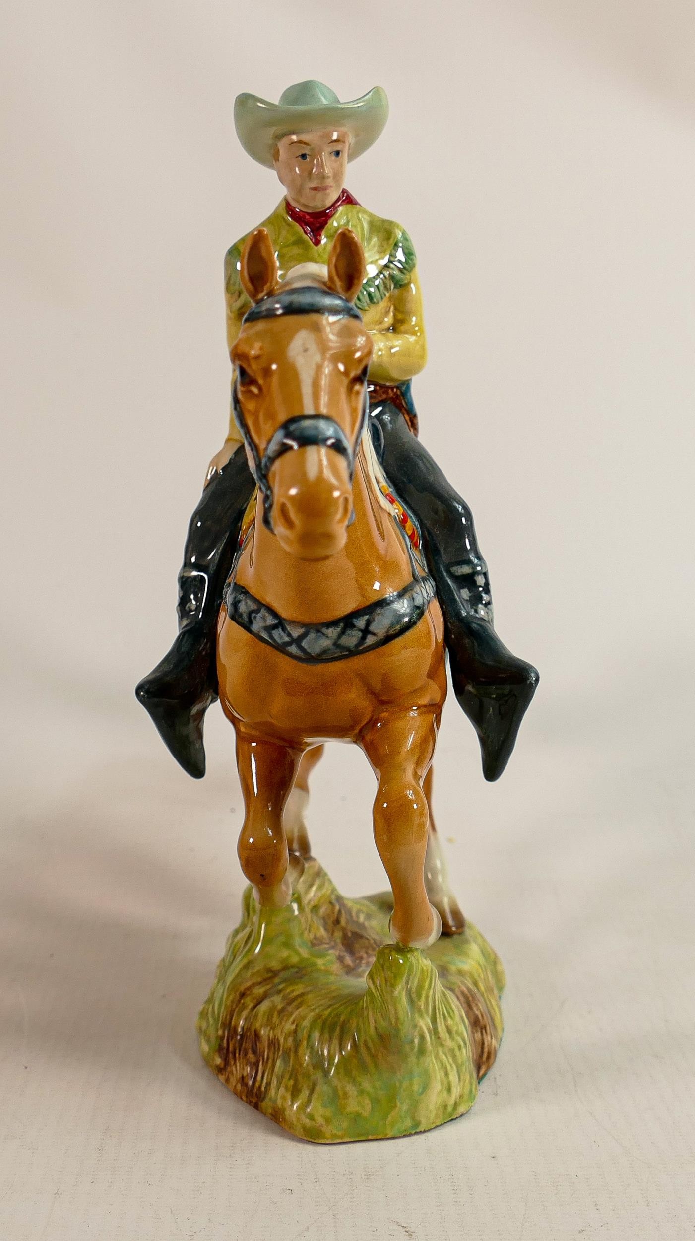 Beswick Cowboy on galloping palomino horse 1377.