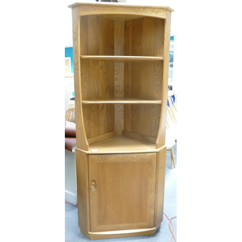 Blonde Ercol Corner Unit, height 179, depth at widest 52cm