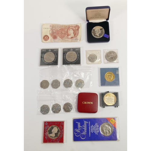 A collection of coins including commemorative coins, 2 10 shilling ...