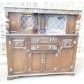 Dark oak priory style Court Cupboard buffet 138cm H 140cm W