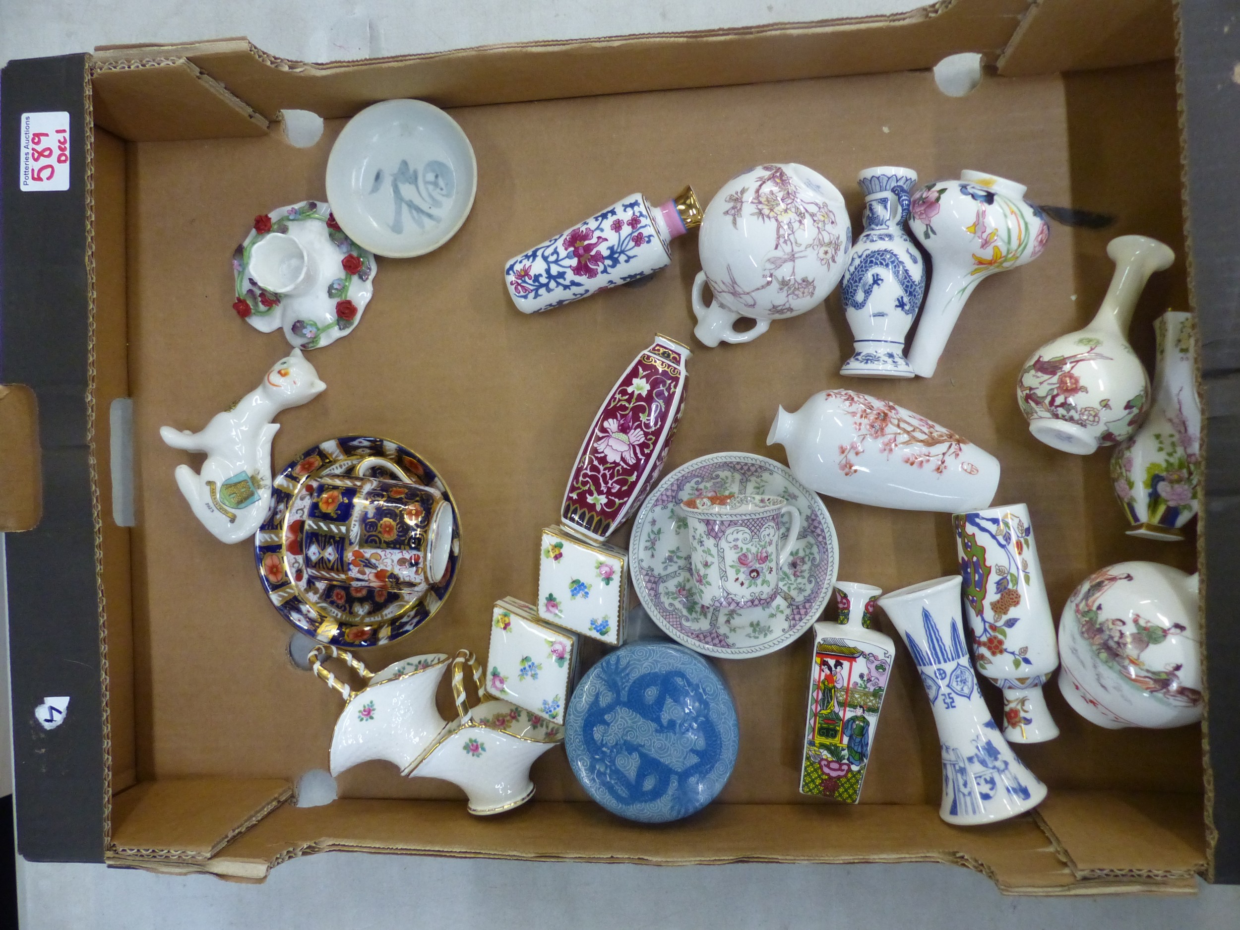 A Mixed Collection of mainly reproduction oriental small vases together ...