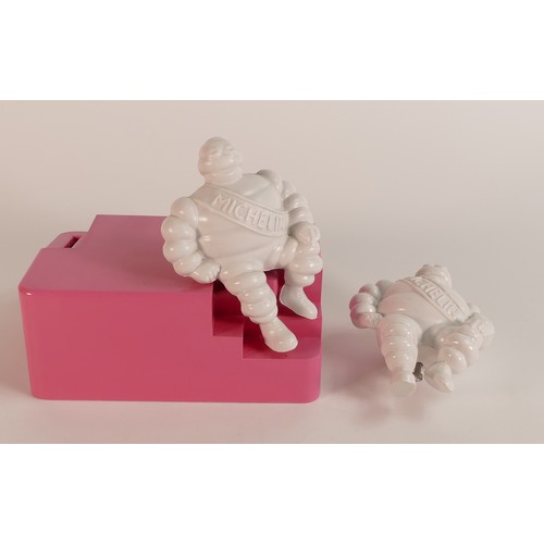 Michelin Bibendum Man, pink money box with additional Bibendum man. (2)