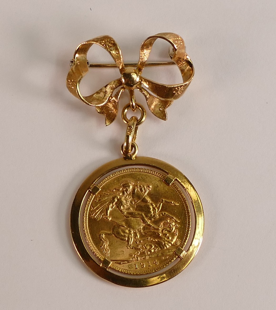 Gold FULL Sovereign, dated 1914, set in 18ct gold quality bow setting ...