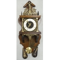 20th Century Weighted Pendulum Wall Clock. Height of clock body: 62cm