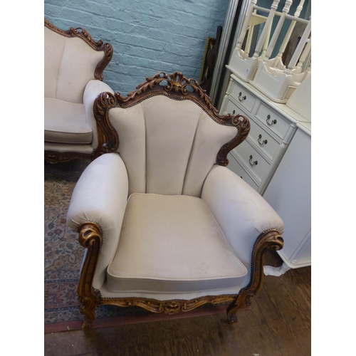 Heavily Carved Walnut French style salon suite. Comprising large 3 seater (W195cm x 98cm) and 2x Arm