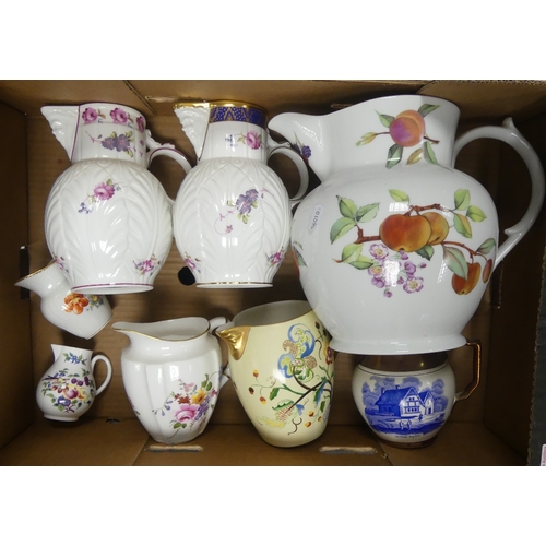 A Mixed Collection of porcelain jugs including examples from Royal ...