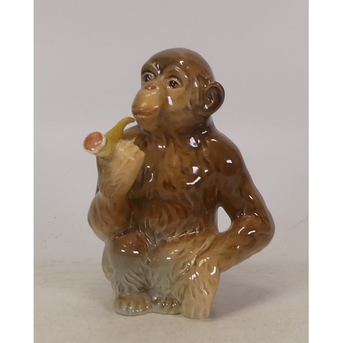 Beswick comical model of seated monkey smoking a pipe, model 1049.