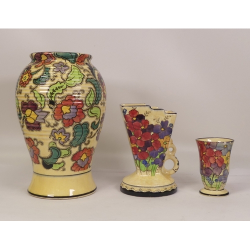 Three Tuscan Decoro Pottery vases of various sizes. (H: 27cm) (3)