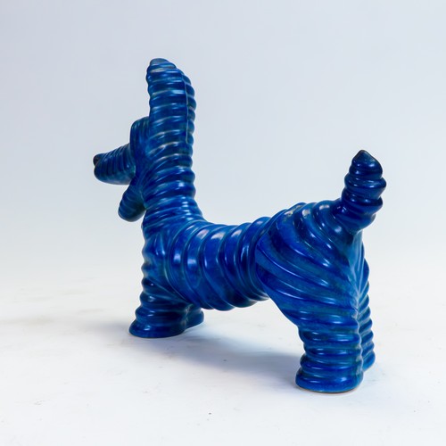 Carlton Ware dark blue ribbed dog, c1930, h.16 x L.20cm.