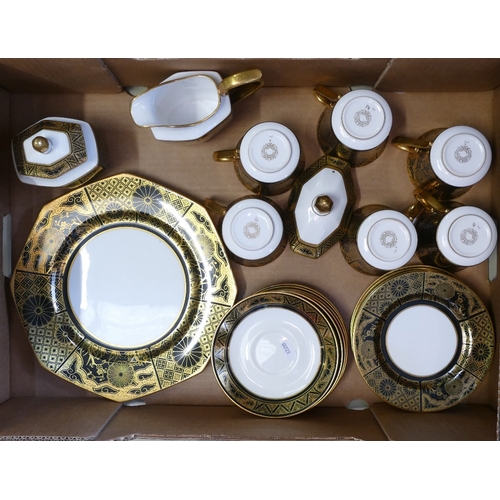 Caverswall 'Imperial gilt on black, part Tea Set to include:- Six ...
