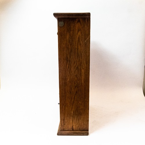 An early 20th century 'Flick Ball' penny slot machine, housed in a ...