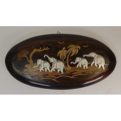 Handcrafted oval inlaid wood wall plaque, depicting a scene of ...