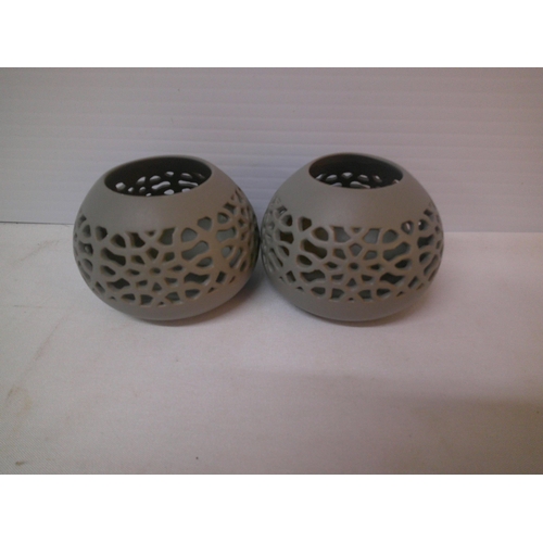 Two small grey pots each 8cmH