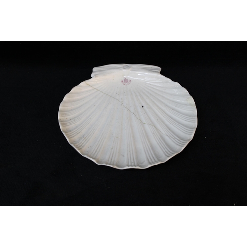 A 1st period Belleek shell plate with crest - with hair crack - 21.5cmD