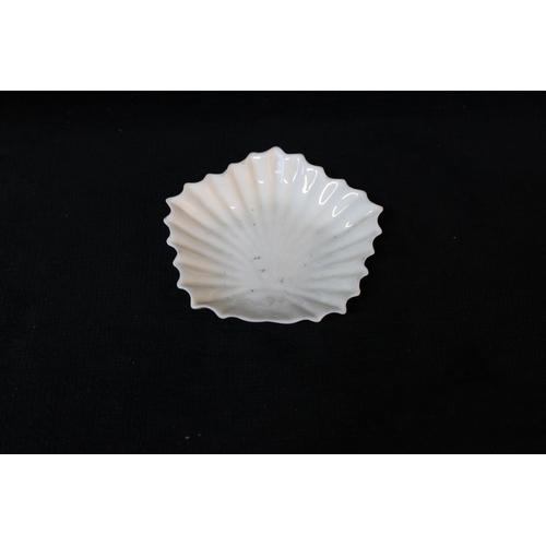 A small Belleek butter dish - unmarked - 10cmD