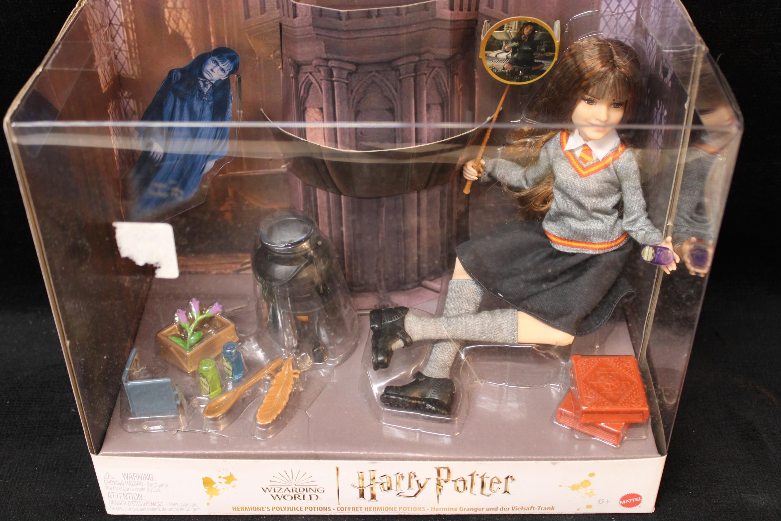 A boxed Harry Potter collection - 25cmW x 20cmH