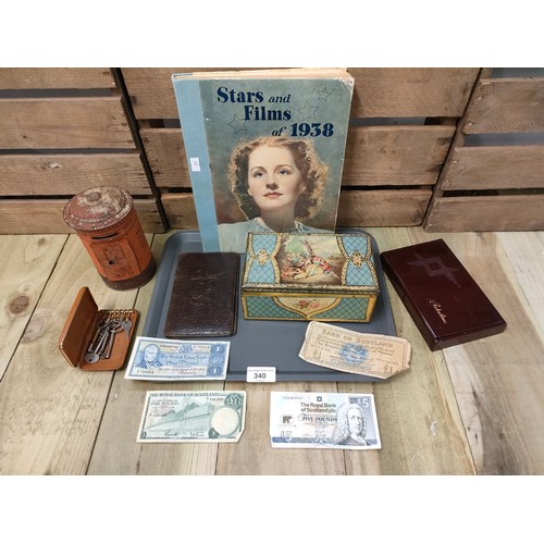 A Tray of collectables; antique tin post office bank, stars & films of ...