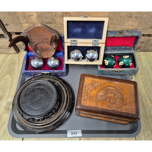 A tray of Oriental collectables; Chinese wooden stands, Chinese Baoding ...