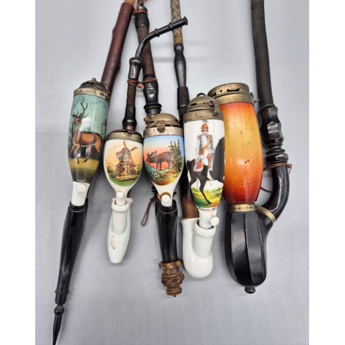 A collection of vintage Bavarian hand painted ceramic smoking pipes ...