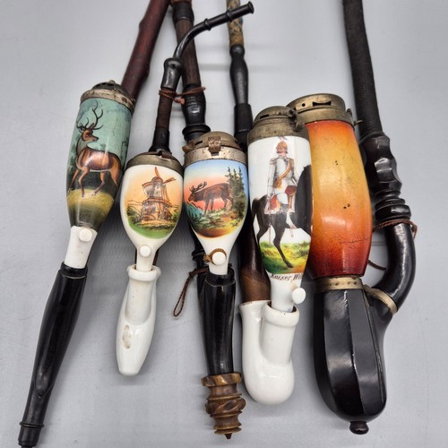 A collection of vintage Bavarian hand painted ceramic smoking pipes ...
