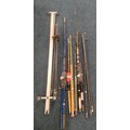 A selection of fishing rods & stands; Ron Thomson rod, Daiwa fishing ...