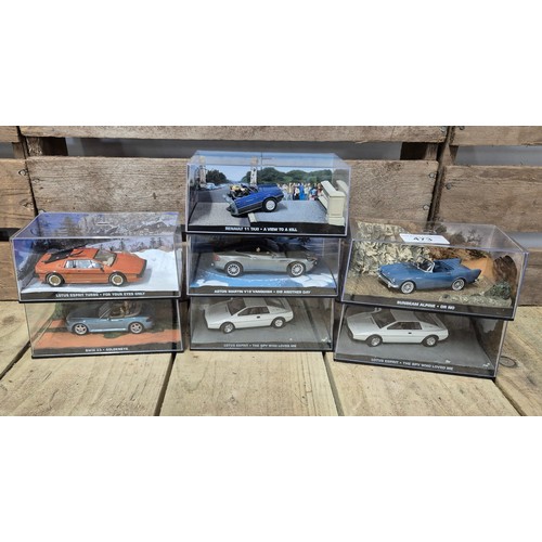 A collection of seven James Bond models Sun beam, lotus esprit models ...
