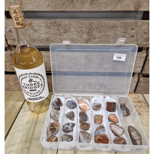 A Tub of mixed geode rocks; various agate and quartz stones.