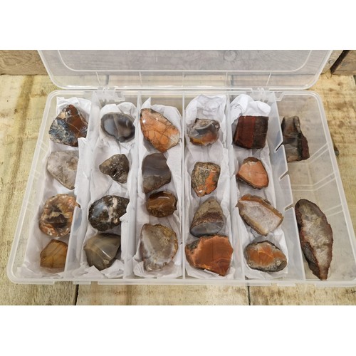 A Tub of mixed geode rocks; various agate and quartz stones.