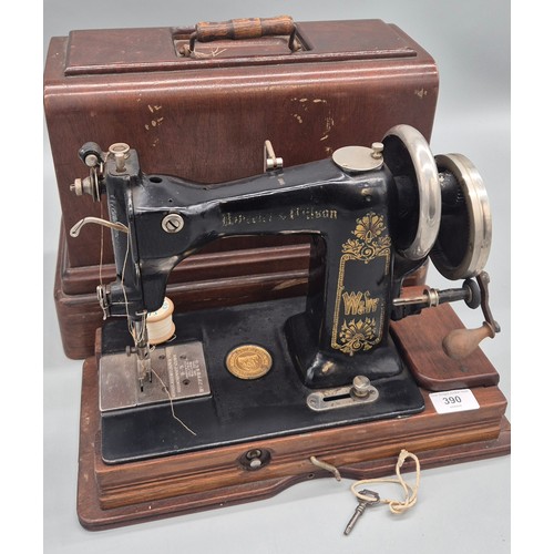 Antique Wheeler & Wilson Sewing machine with fitted wooden casing & key