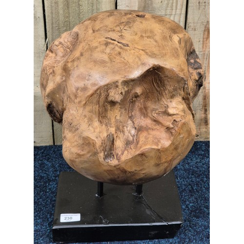 Teak sphere sculpture. Raised on two steel rods and rectangular base ...