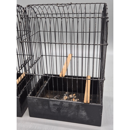 Pair of early 20th century small bird cages. 36x23cm.