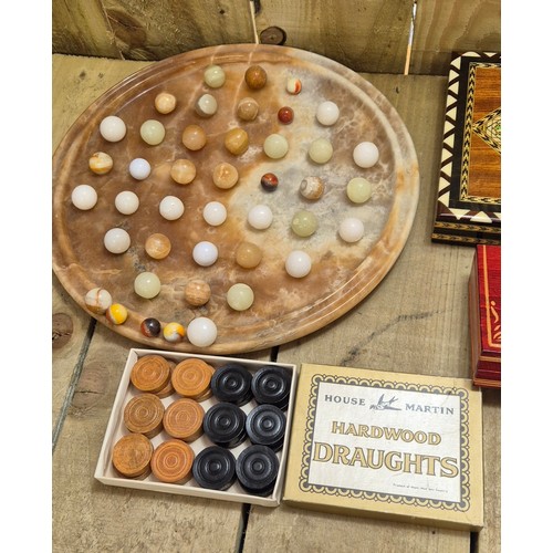 Selection of vintage games; Solitaire marble game, Mahjong and others.
