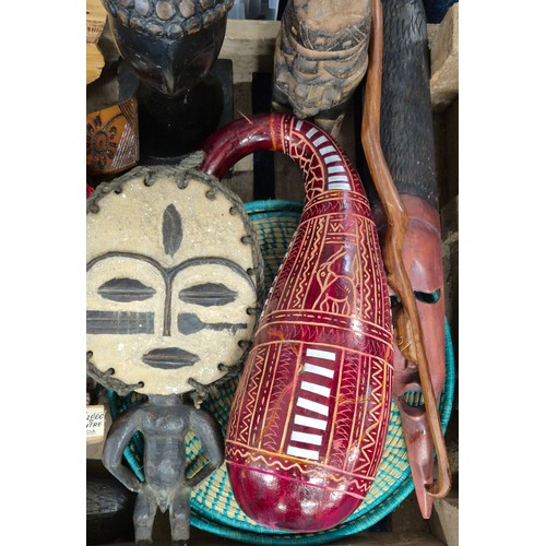 Crate of African Collectables; carved tribal figures, African head bust ...