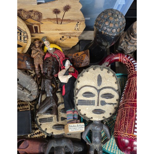 Crate of African Collectables; carved tribal figures, African head bust ...