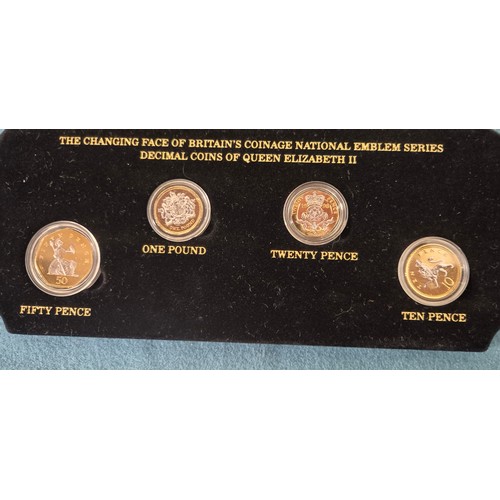 Two boxed sets of The London Mint Office Coin Sets with certificates ...