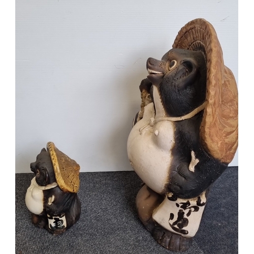 Pair of Japanese Tanuki Ceramic Figures H: 70cm and H: 30cm